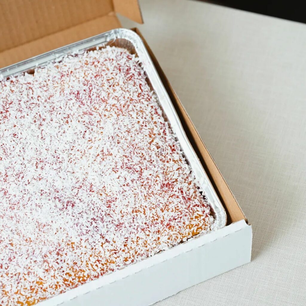 Jam Coconut Sponge Traybake - 16 Pieces - Sunset Desserts | Bakery ...